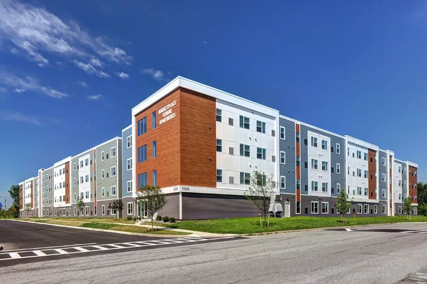 Developers, officials christen Marketplace Senior Apartments